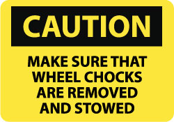 NMC - "Caution - Make Sure That Wheel Chocks Are Removed and Stowed ...
