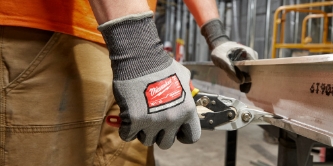 man working using a Milwaukee hand tool