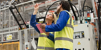 two people in safety gear